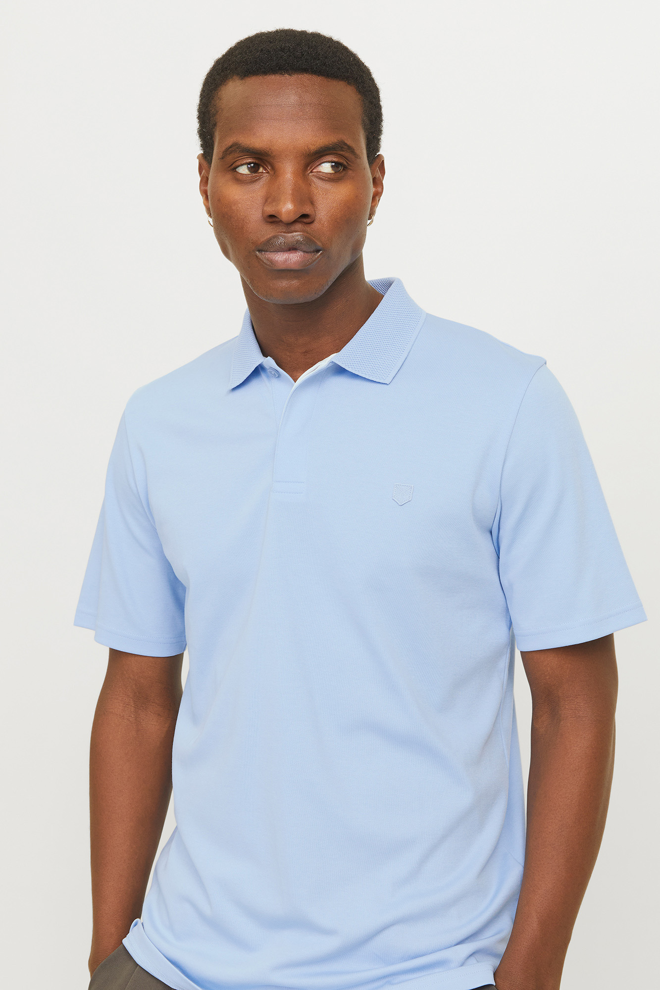 Polo liso regular fit | Polos de hombre | SPF